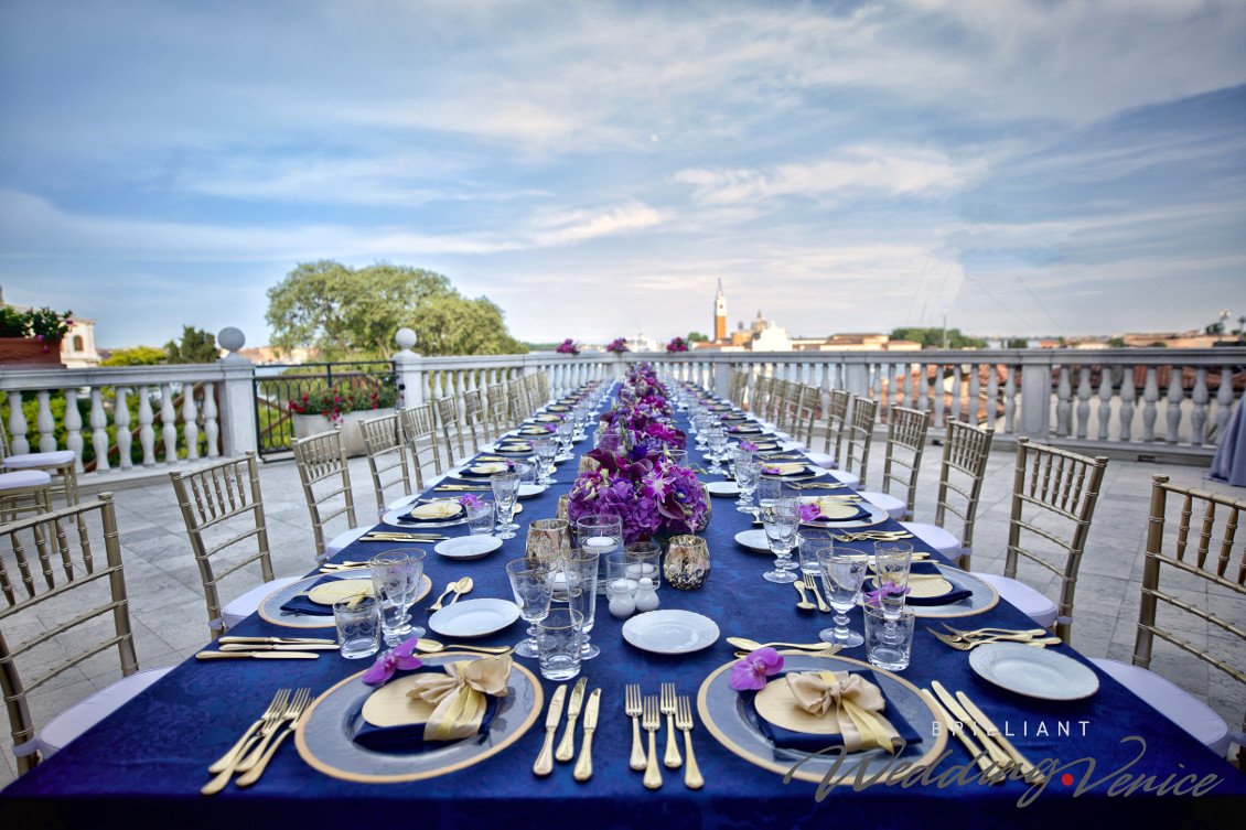 Wedding dinner in Venice, set on a rooftop terrace